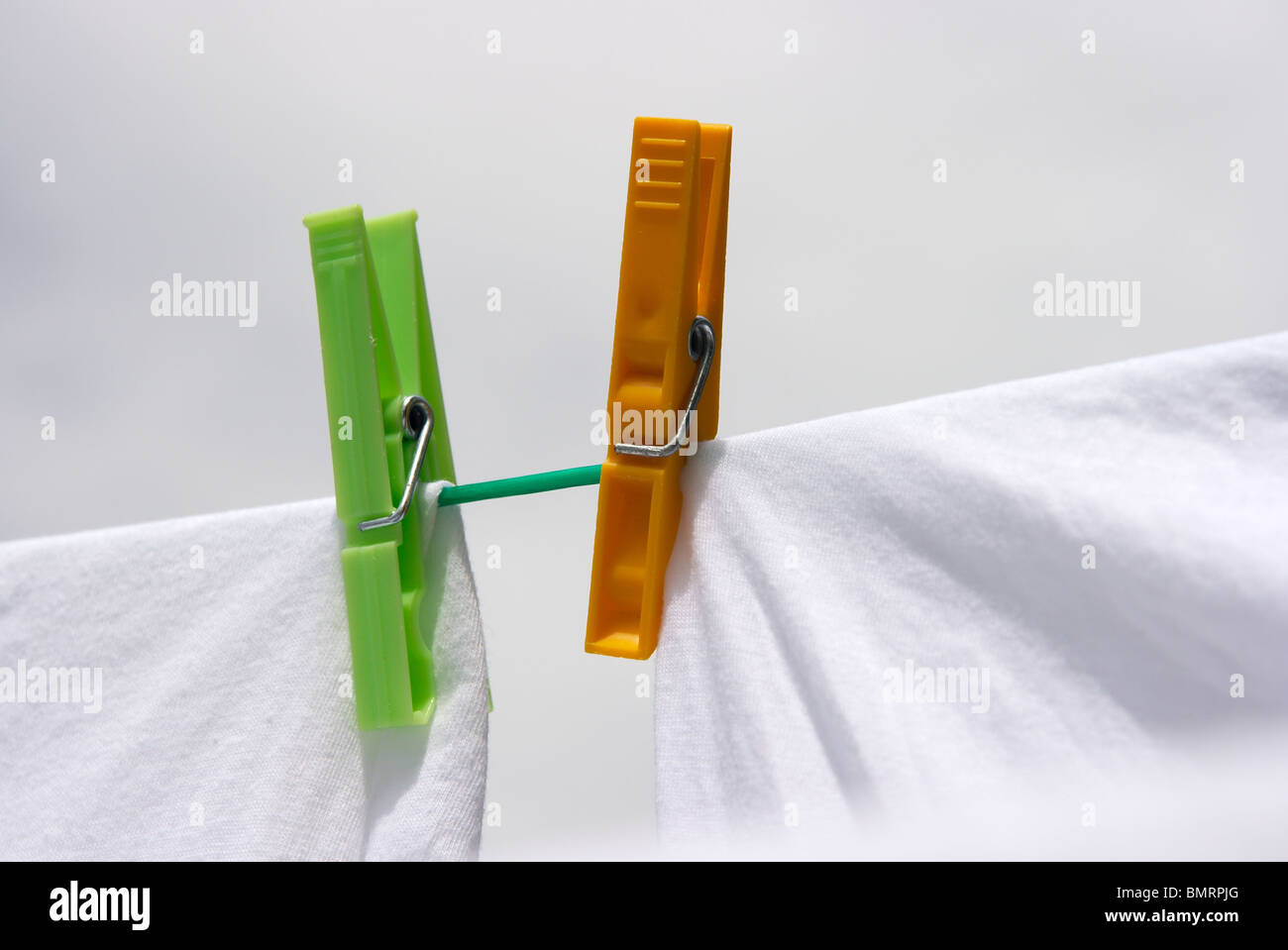 closeup of clothes and clothes-pegs on a rope Stock Photo - Alamy