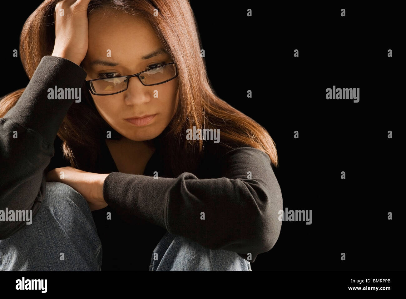 A Young Woman Looking Sad Stock Photo - Alamy