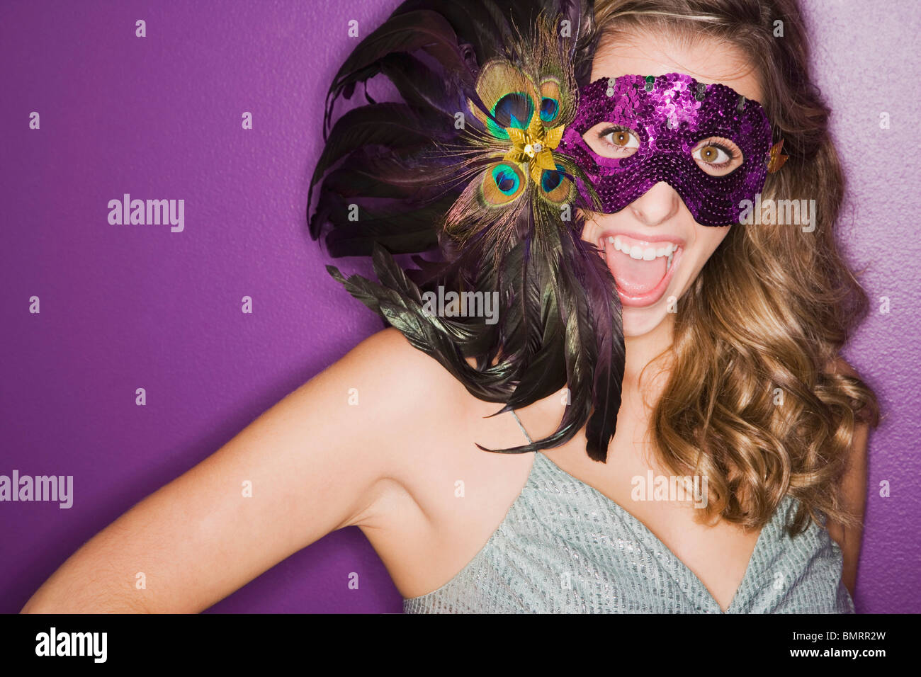 A Woman Wearing A Party Mask Stock Photo - Alamy