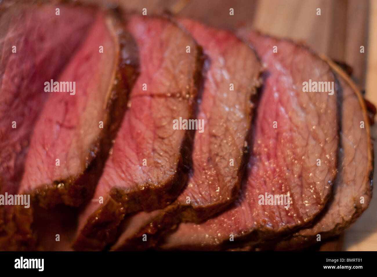 Close up of sliced medium rare steak Stock Photo - Alamy