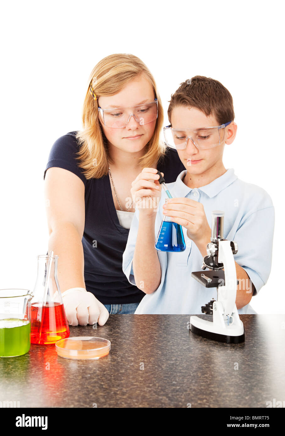 Children doing science experiments in school. Isolated on white Stock ...