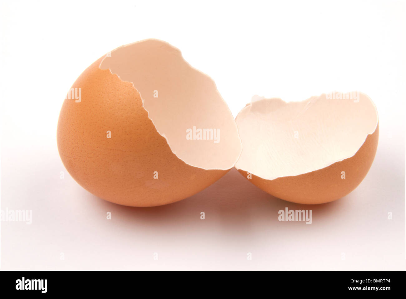 empty broken egg, isolated on white background Stock Photo - Alamy