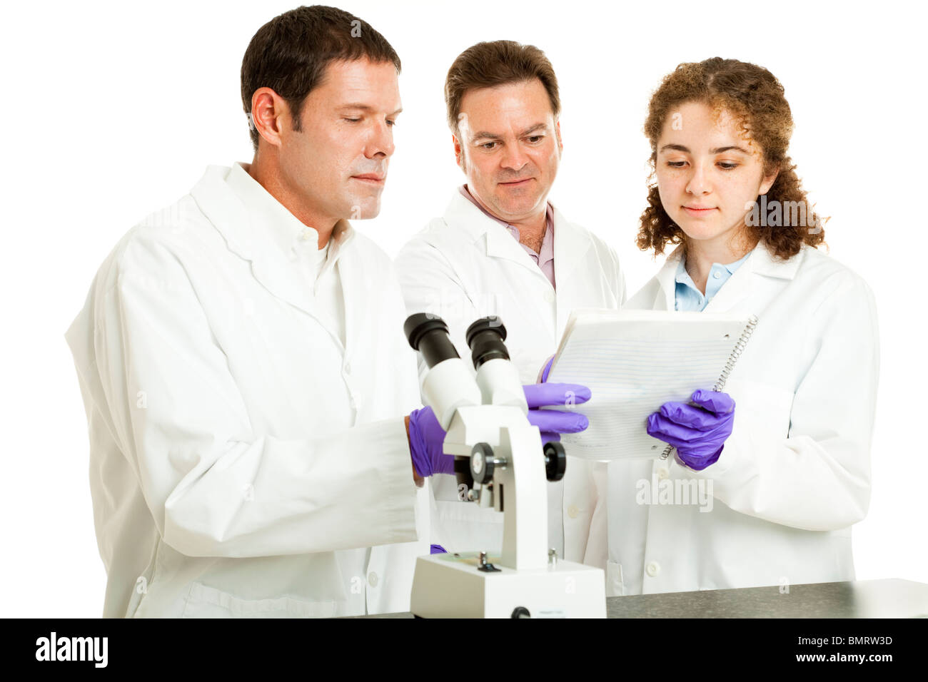 Group of doctors reading test results. Isolated on white Stock Photo ...