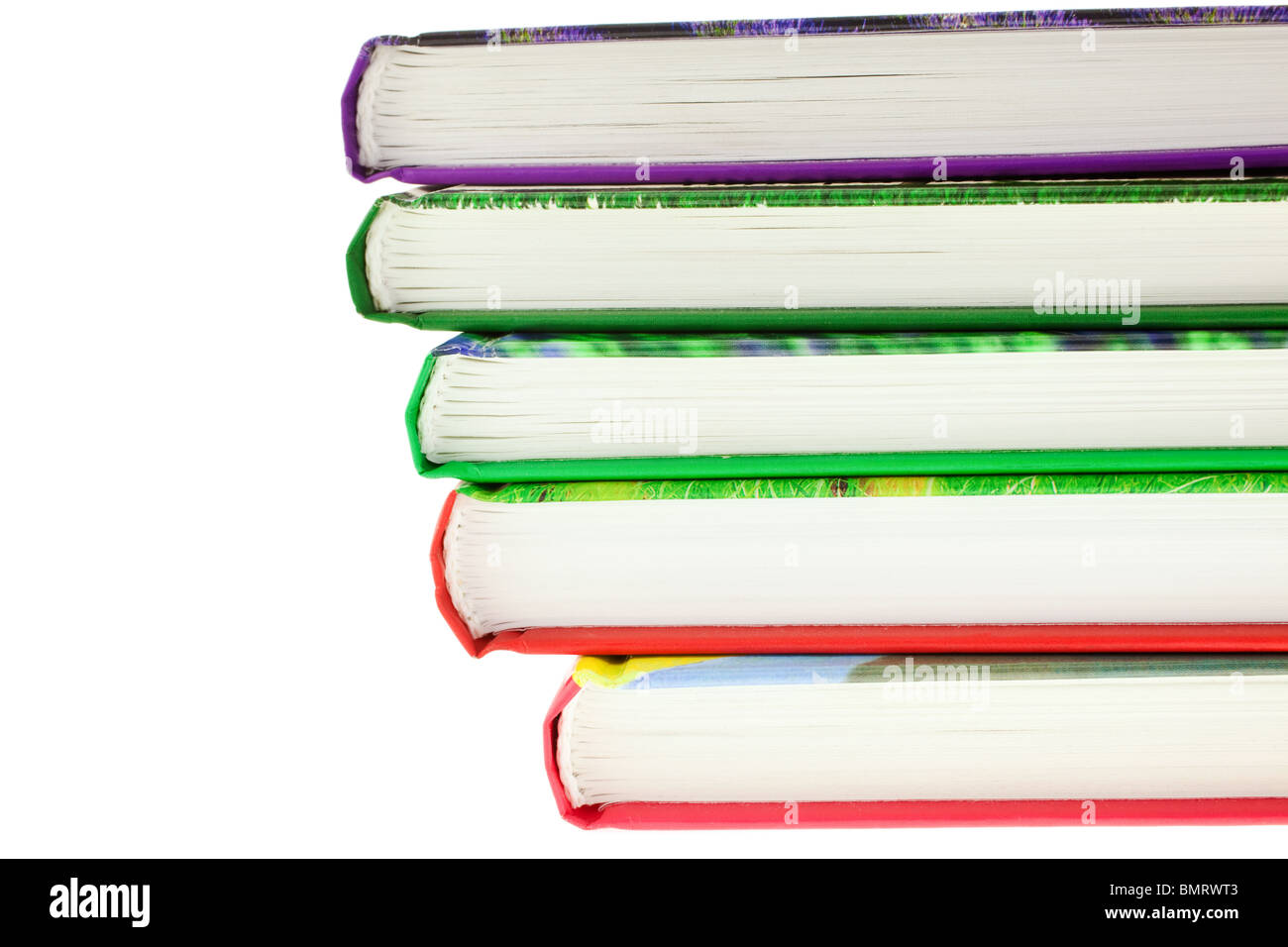 multicolored books stack isolated on white background. horizontal shot Stock Photo - Alamy