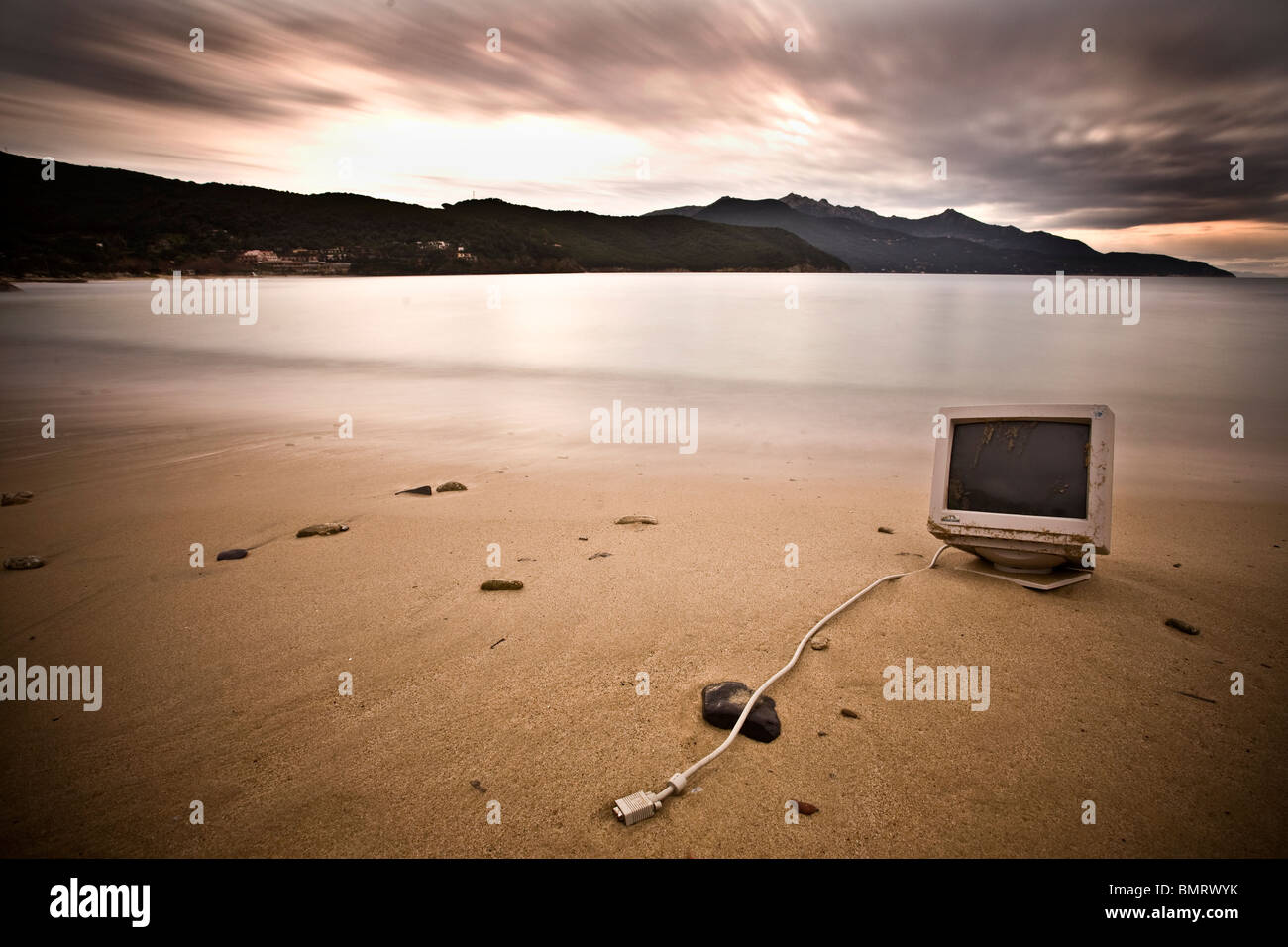 an old computer abandoned on a beach during winter Stock Photo - Alamy