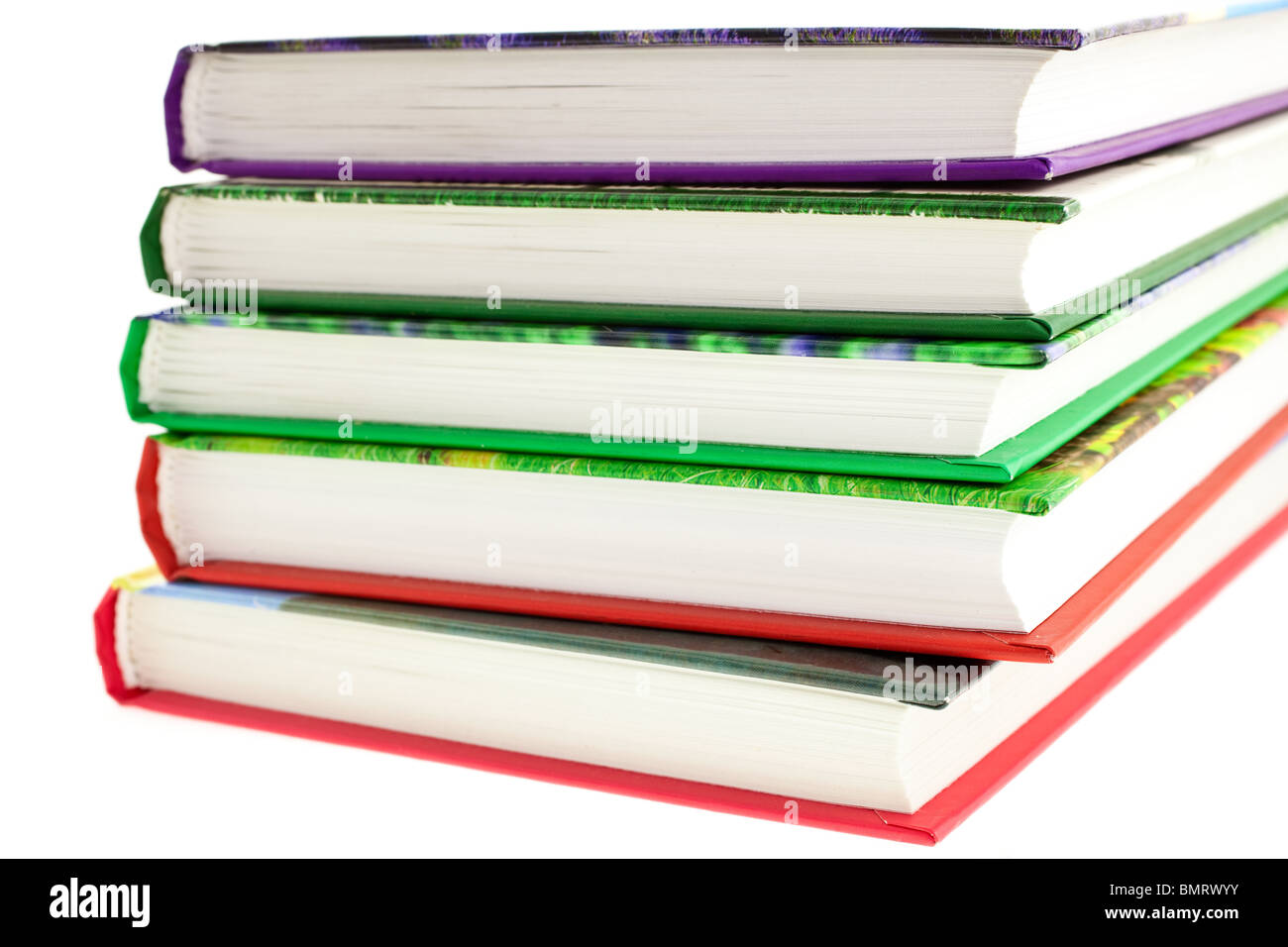 multicolored books stack isolated on white background. horizontal shot Stock Photo - Alamy