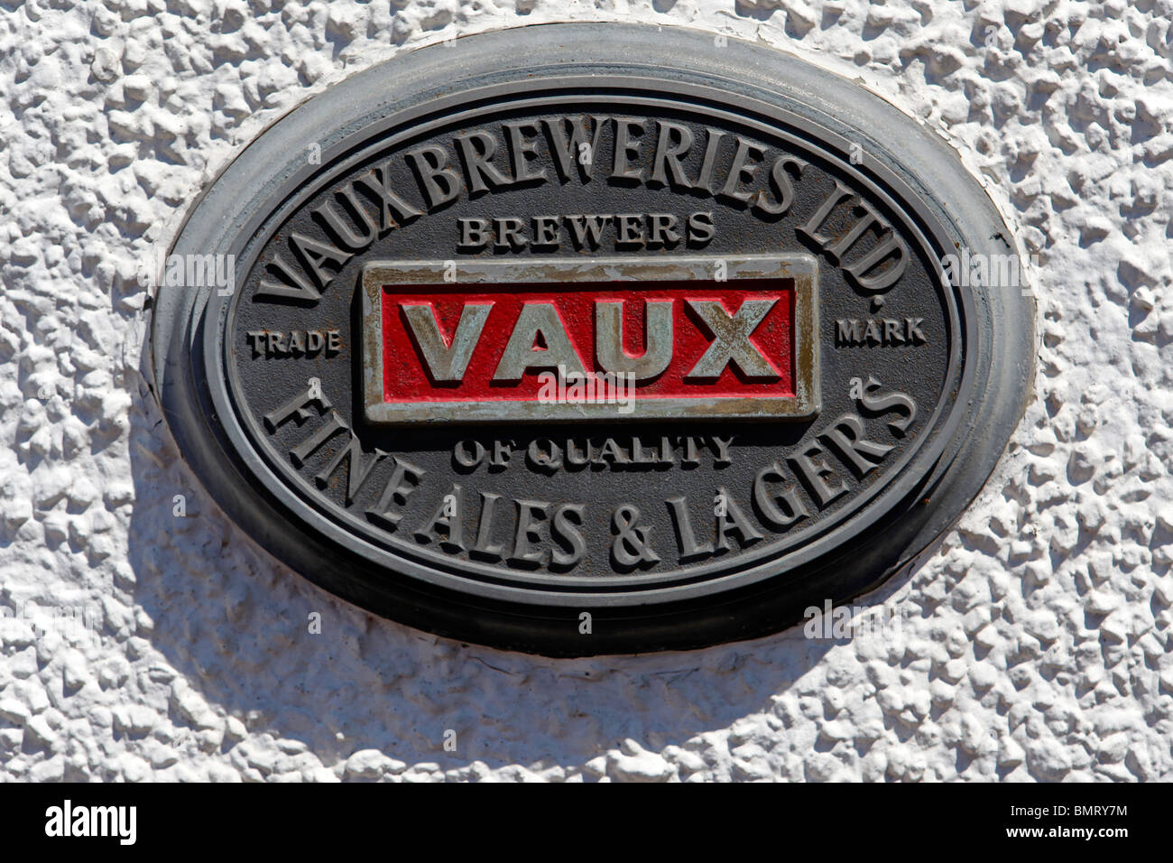 A Vaux Breweries sign on the wall of a British pub Stock Photo - Alamy