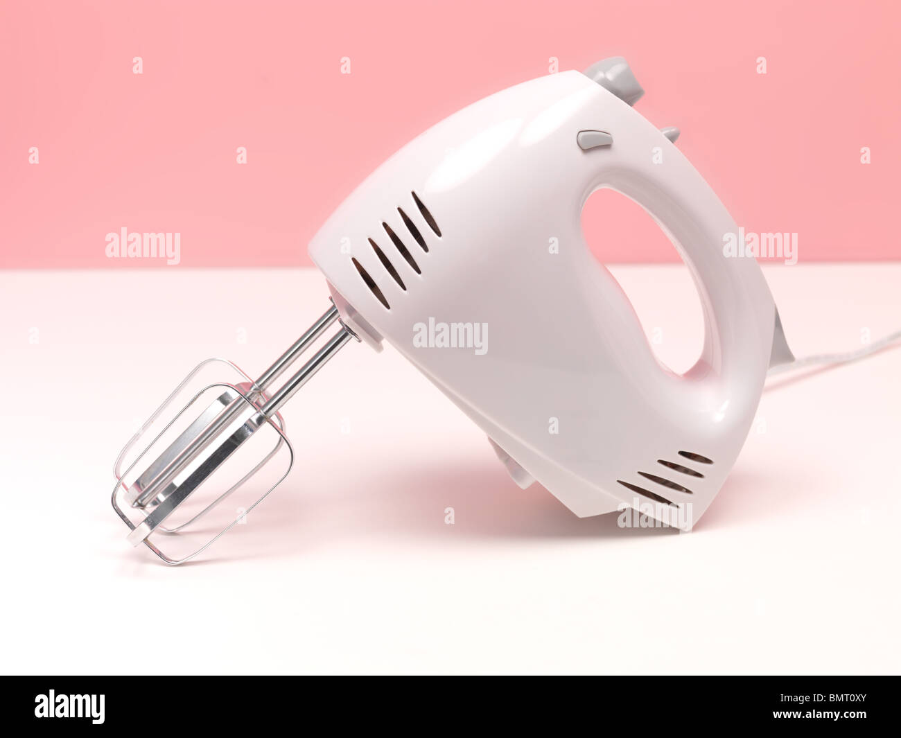 An electric hand mixer on a kitchen bench Stock Photo - Alamy
