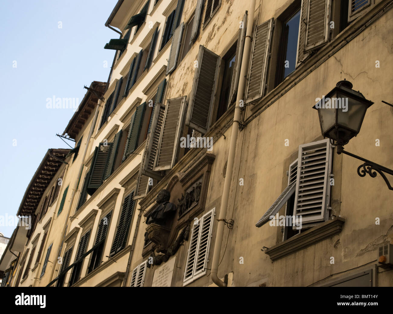 Florence (Tuscany) windows of different size and style: view upwards ...