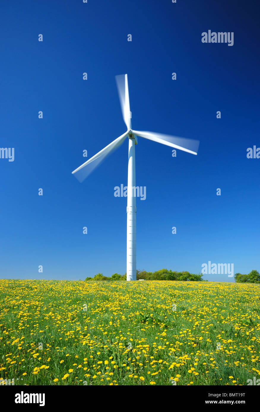 Electricity power wind generator pole against blue sky background Stock ...