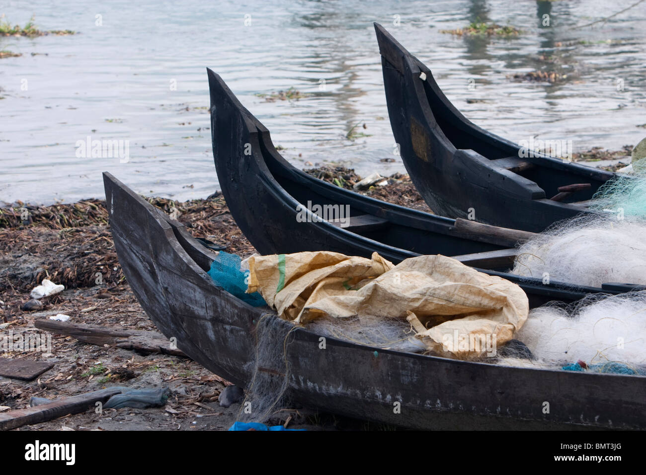 Wooden canoes used for fishing. Kerala, India Stock Photo - Alamy