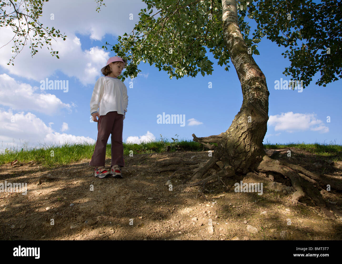 little girl and tree Stock Photo - Alamy