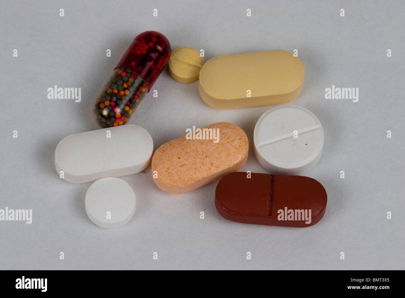Tablets on white background Stock Photo - Alamy