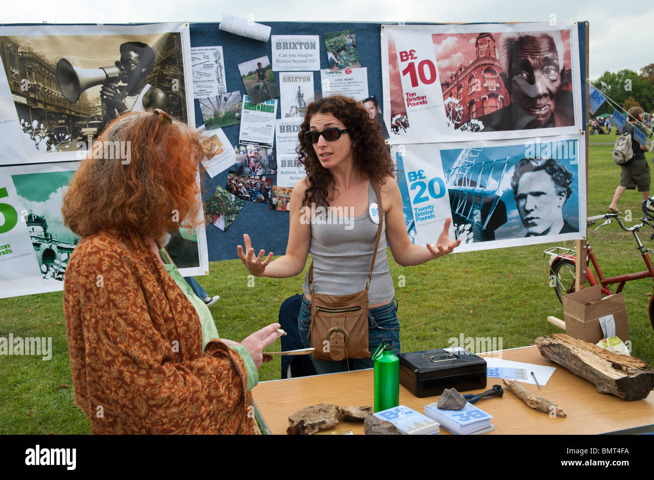 Woman explaining the Brixton pound, a local currency that can be used ...