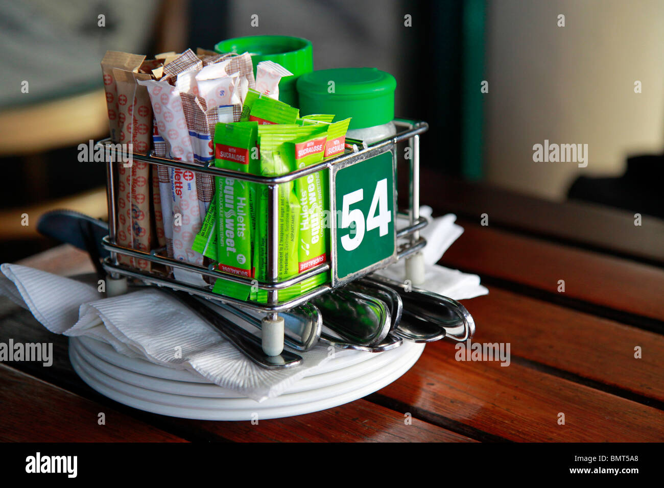 Table setting with condiments at outdoor restaurant in Kirstenbosch ...