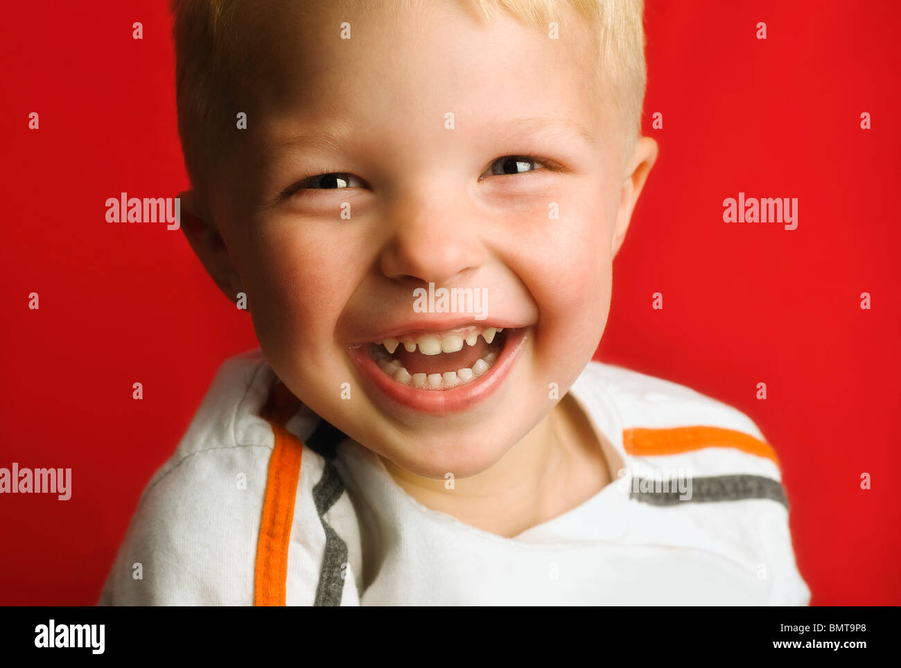 A Young Boy Laughing Stock Photo - Alamy