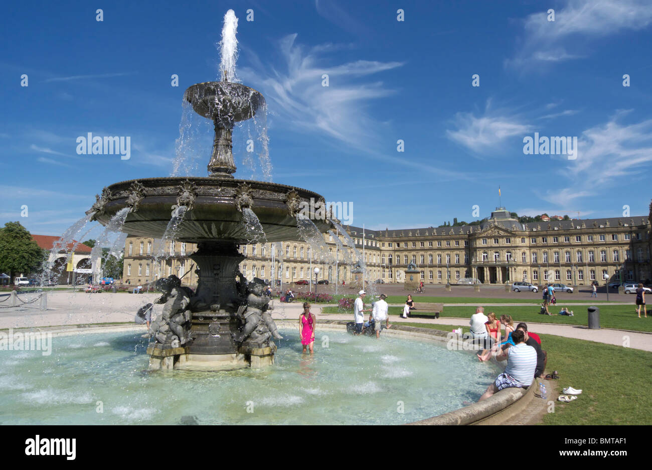 Fountain at Schlossplatz square, Neues Schloss (New Palace) in the ...