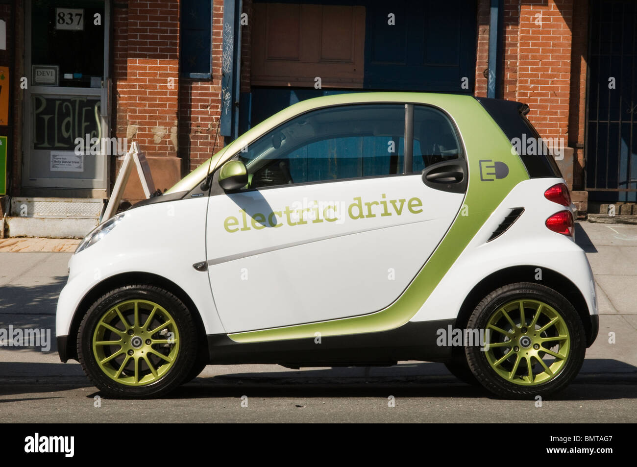 smart cars electric drive cars parked on the street Stock Photo - Alamy