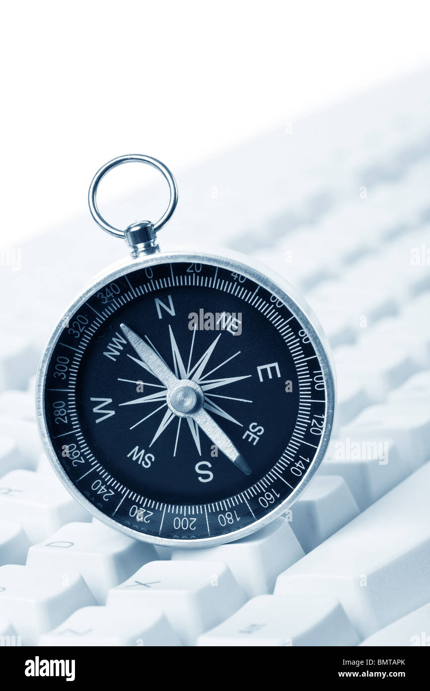Computer Keyboard and Compass, internet concept Stock Photo - Alamy