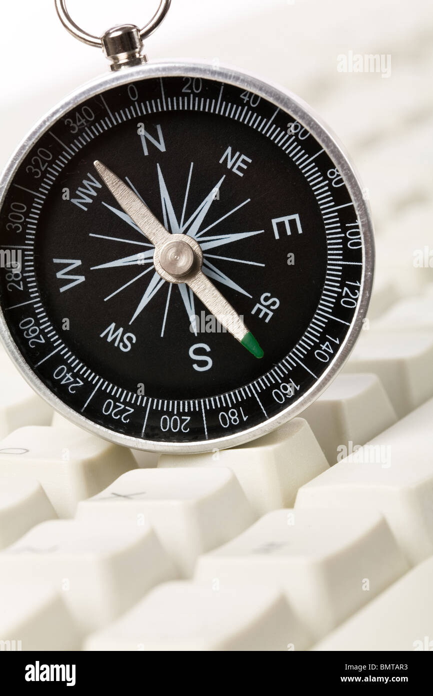 Computer Keyboard and Compass, internet concept Stock Photo - Alamy