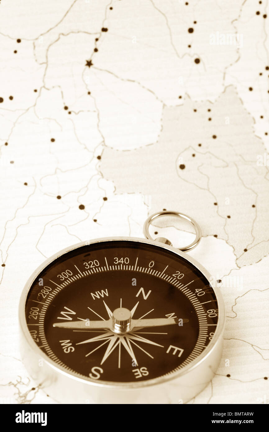 Compass and map close up shot Stock Photo - Alamy