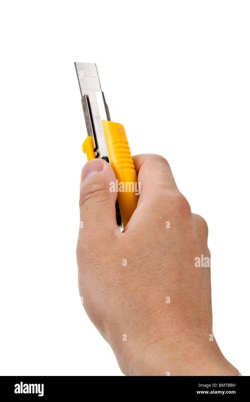 Hand Holding a Cutter Knife, white background Stock Photo - Alamy