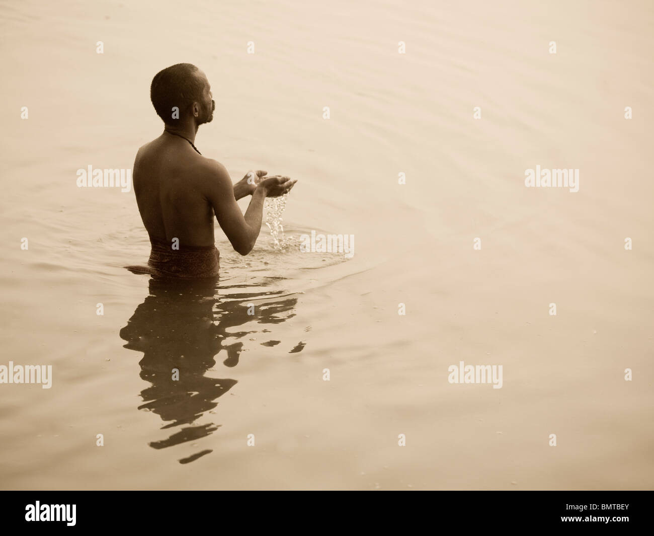 The Ganges,Varanasi,India;Man Bathing In The River Stock Photo - Alamy