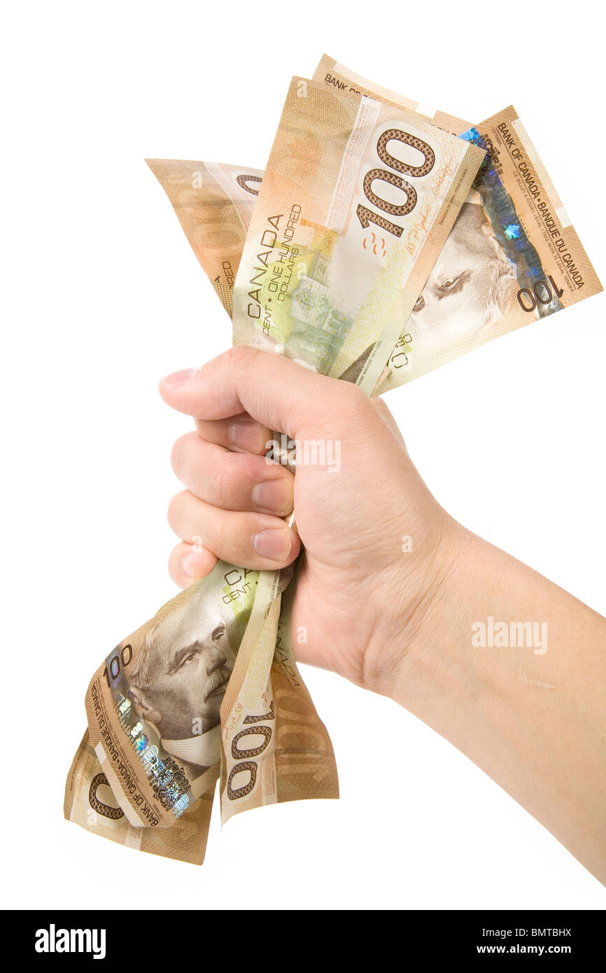 Hand full canadian dollars financial Cut Out Stock Images & Pictures ...