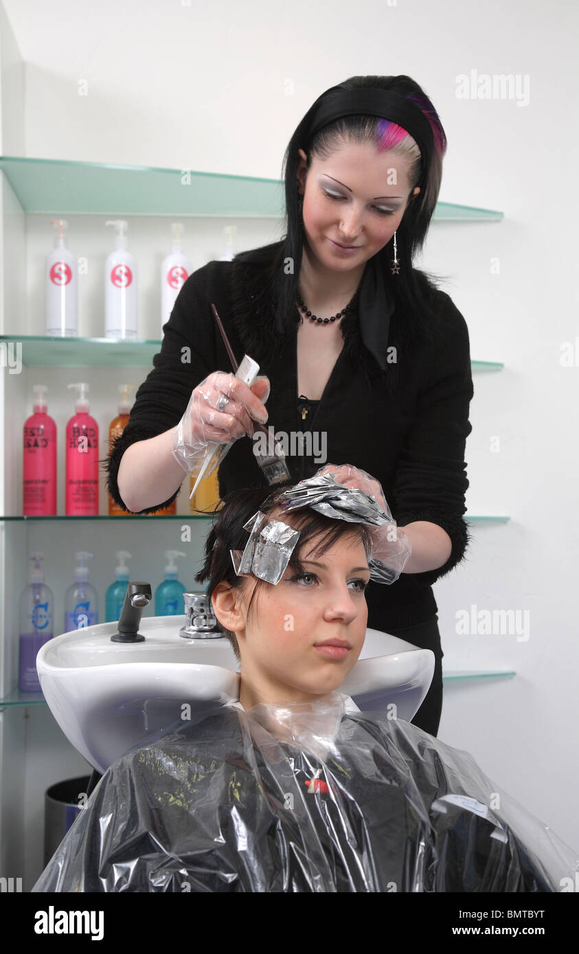 A trainee hairdresser in the Morante salon, Essen, Germany Stock Photo ...