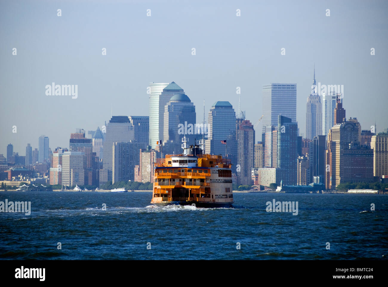 The John J. Marchi Staten Island ferry travels across the harbor to ...