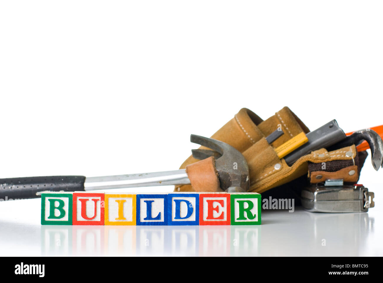 Colorful children's blocks spelling BUILDER with tool belt Stock Photo ...