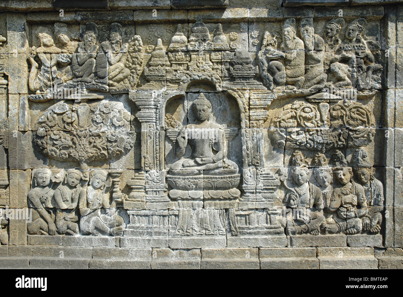 Indonesia-Java-Borobudur, Buddha in shrinelet in Padmasana on Lotus ...