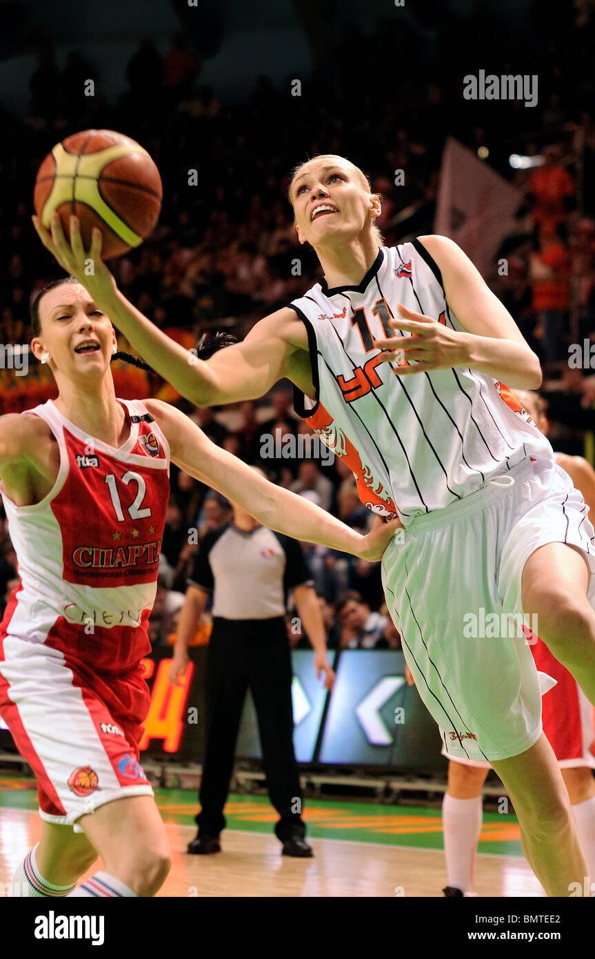 Maria Stepanova #11 attacks. Irina Osipova #12 at the background Stock ...