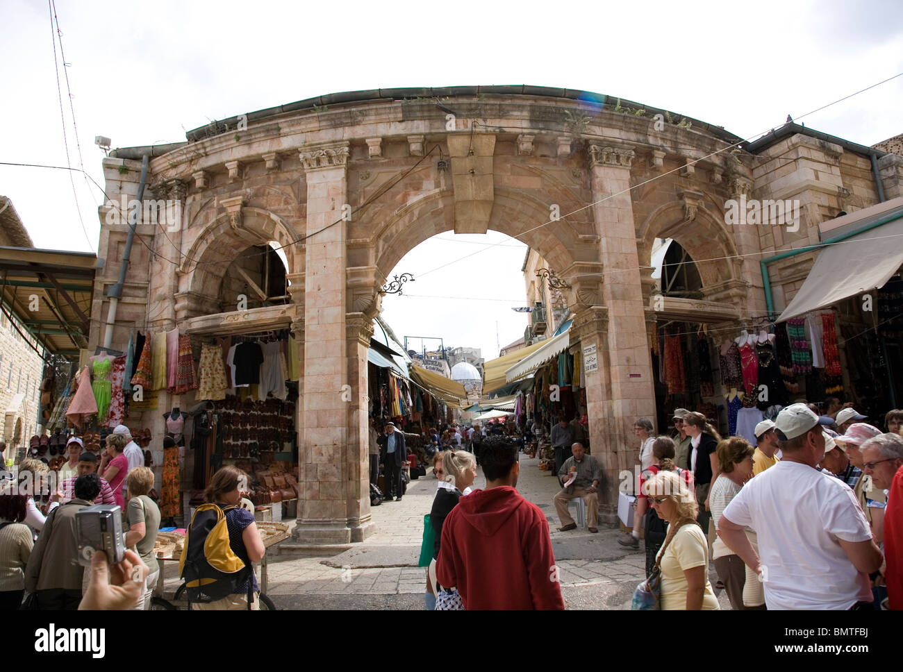 Tourists at The Muristan Arch in Jerusalem Stock Photo - Alamy