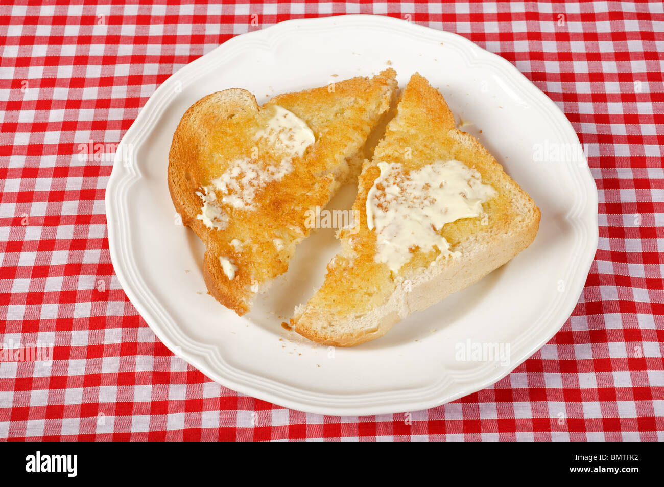 Buttered white bread toast Stock Photo - Alamy