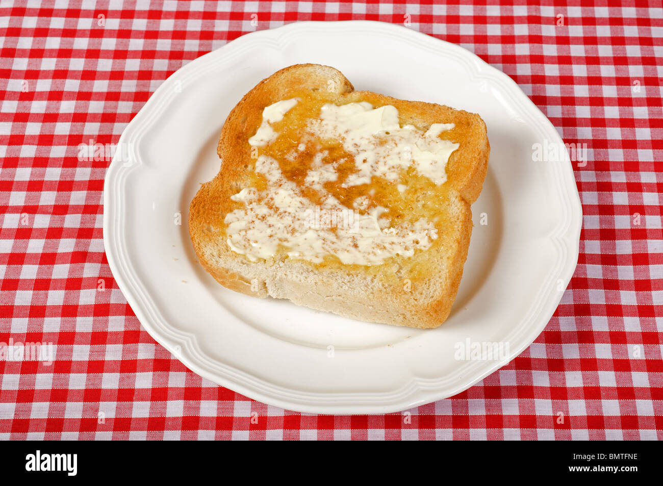 Buttered white bread toast Stock Photo - Alamy
