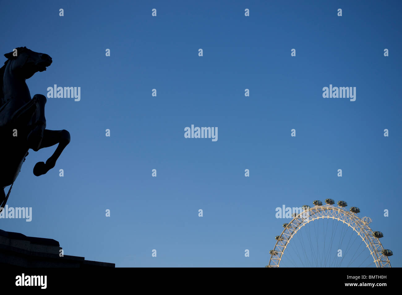 London Eye and Statue Stock Photo - Alamy