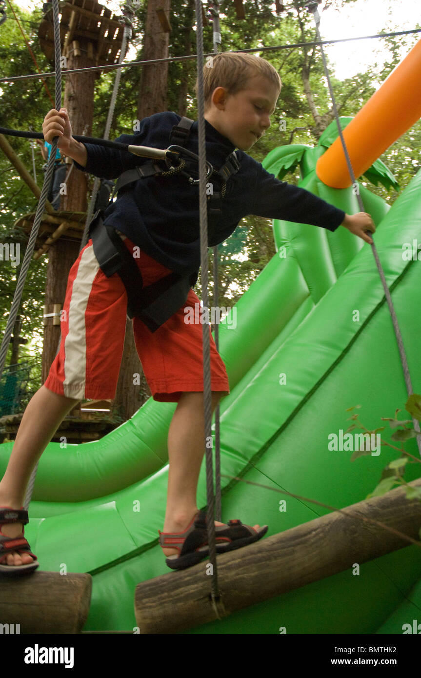 Boy on Bonobo aerial rope course, Quimper, France, Europe Stock Photo ...