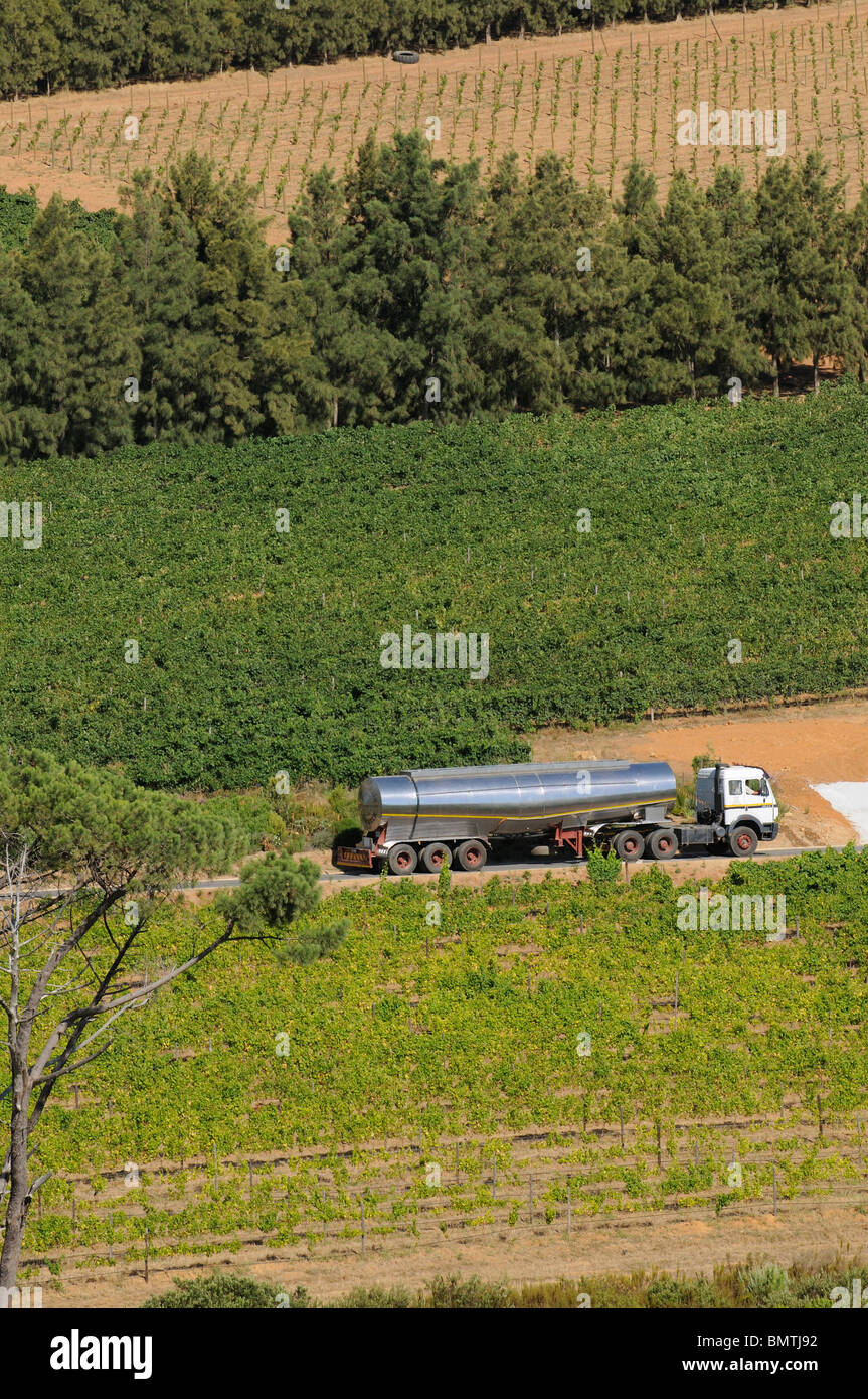 Tanker truck carrying wine passing through the Waterkloof Wine estate ...