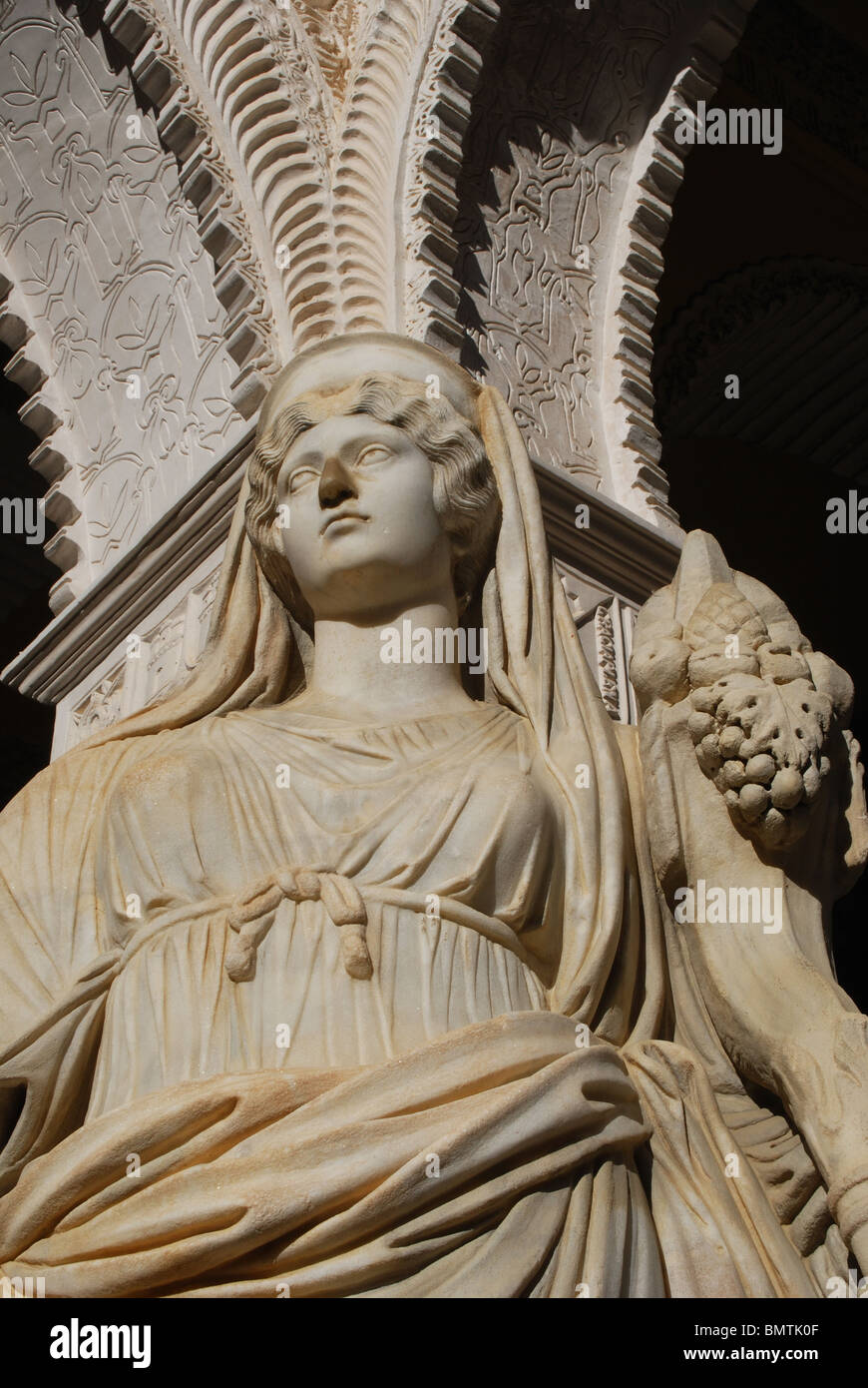 Statuette of Astarte-Tanit in the courtyard, Casa de Pilatos, Seville ...