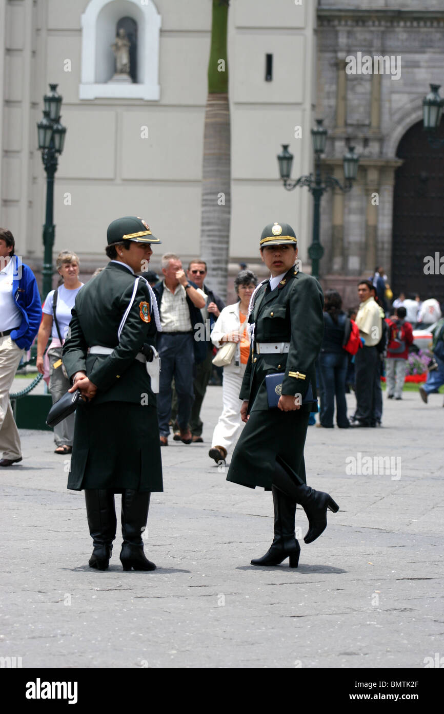 Women looking at police hi-res stock photography and images - Alamy