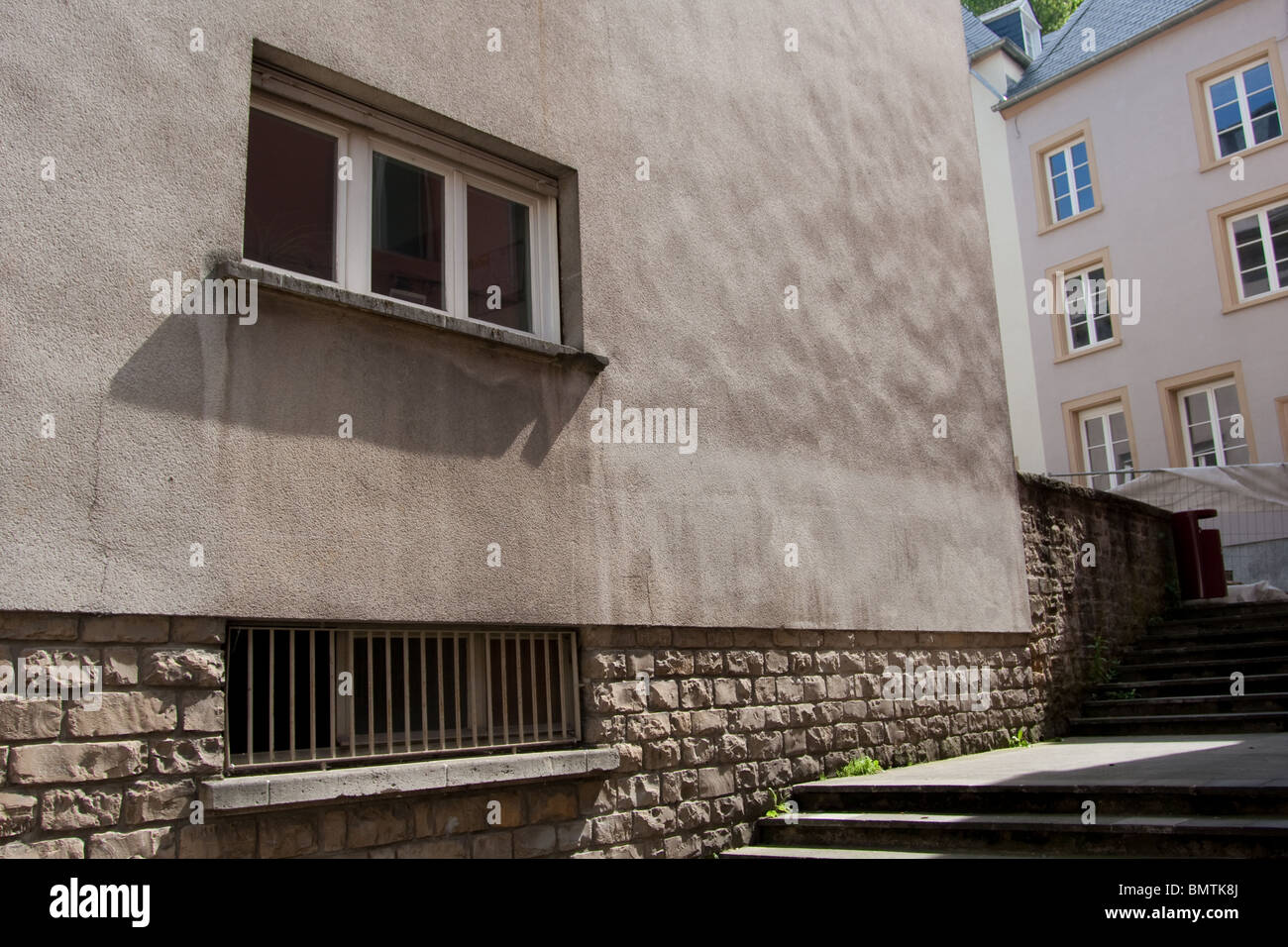passage alley wide window steps shadows home path Stock Photo - Alamy