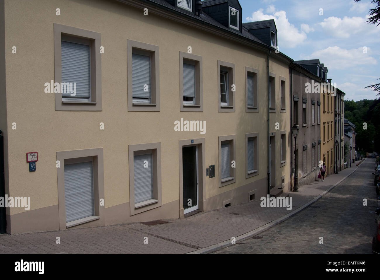 terraced houses blinds windows steep hill doorway Stock Photo - Alamy