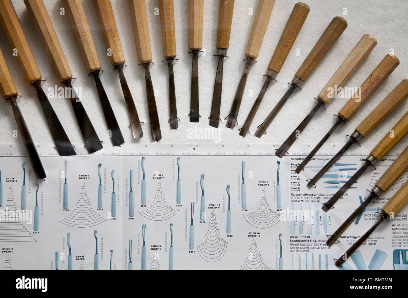 Wood carving tools display Stock Photo - Alamy