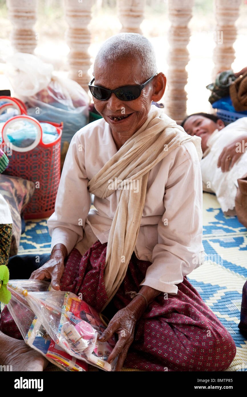 Portrait of elderly female monk in the Banteay Srei Pagoda Angkor Wat ...