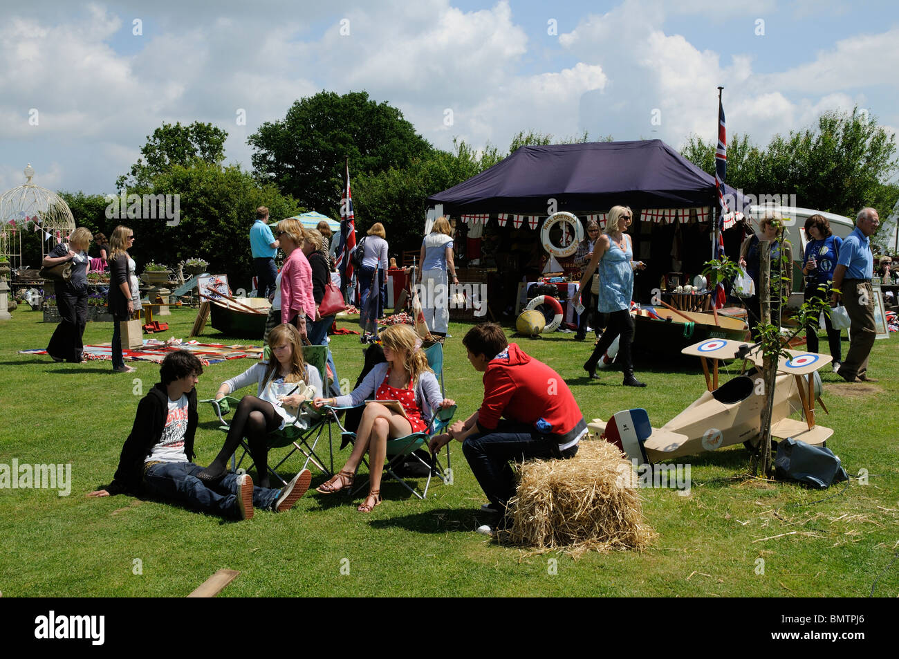 Visitors at a summer fair rural England Stock Photo - Alamy