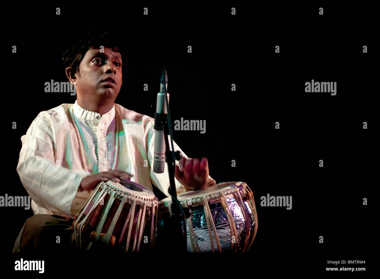 Subhasis Battacharjee playing the Tabla, Belfast, June 2010 Stock Photo ...