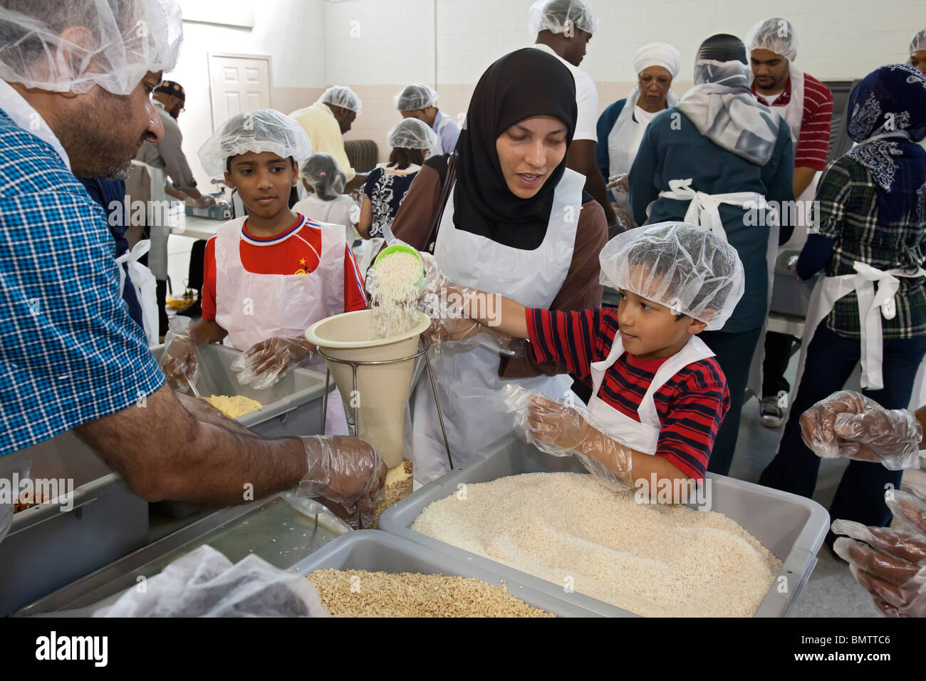 Muslim man woman child united states hi-res stock photography and ...
