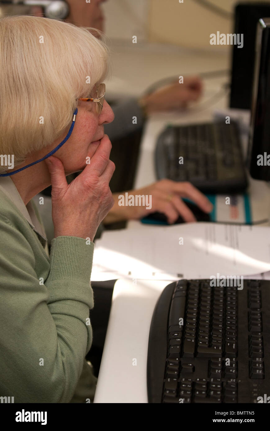 Elderly people surfing the internet, Peckham, London, UK Stock Photo ...