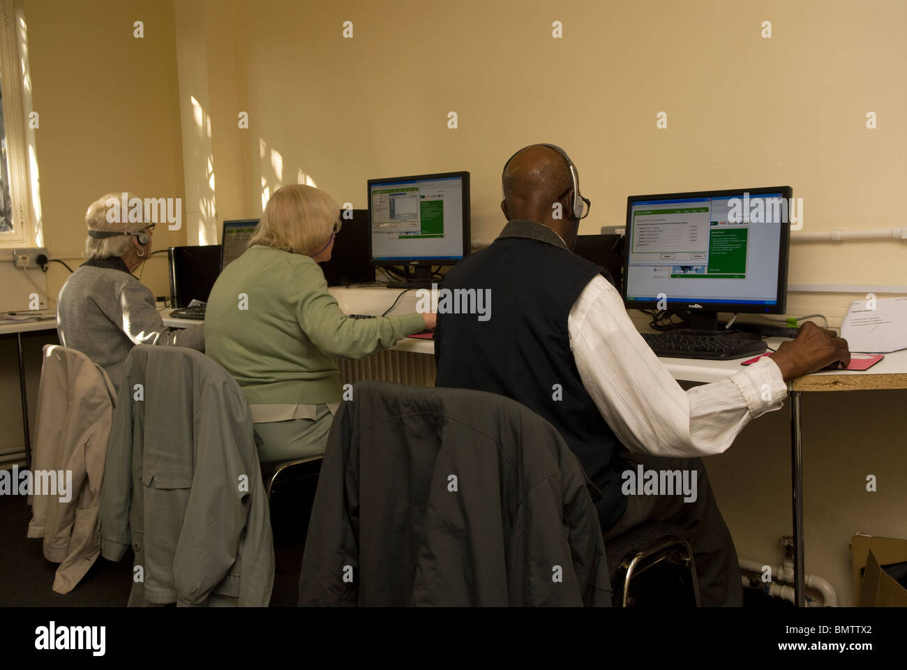 Elderly people surfing internet peckham hi-res stock photography and ...